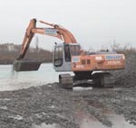 Digger at work on the Waimakiriri. (Photo: G. Fenwick) | Earth Sciences ...