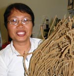 Belinda Longakit holds a specimen of a common New Zealand sponge ...