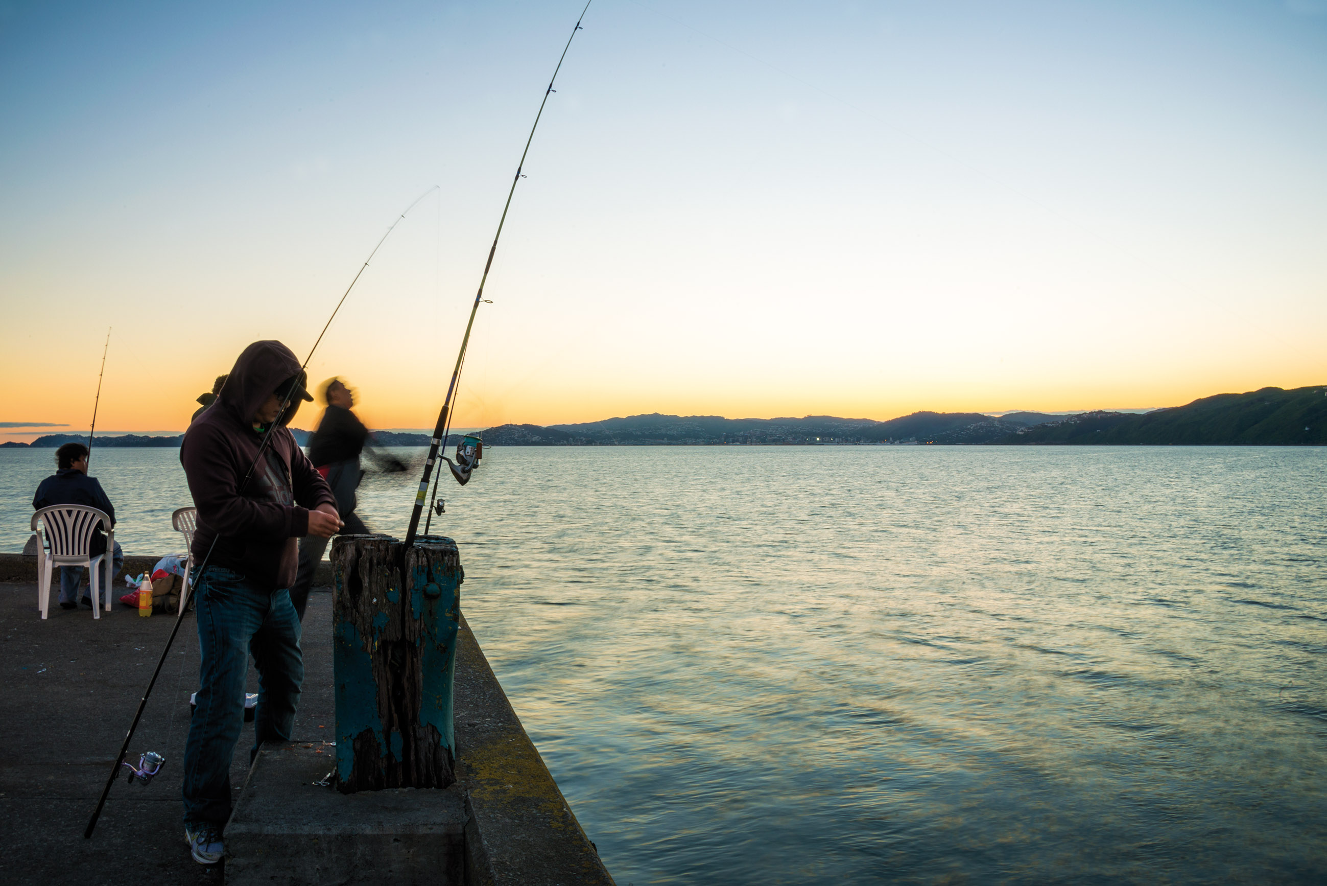 Recreational fishers on Petone wharf | Earth Sciences New Zealand | NIWA