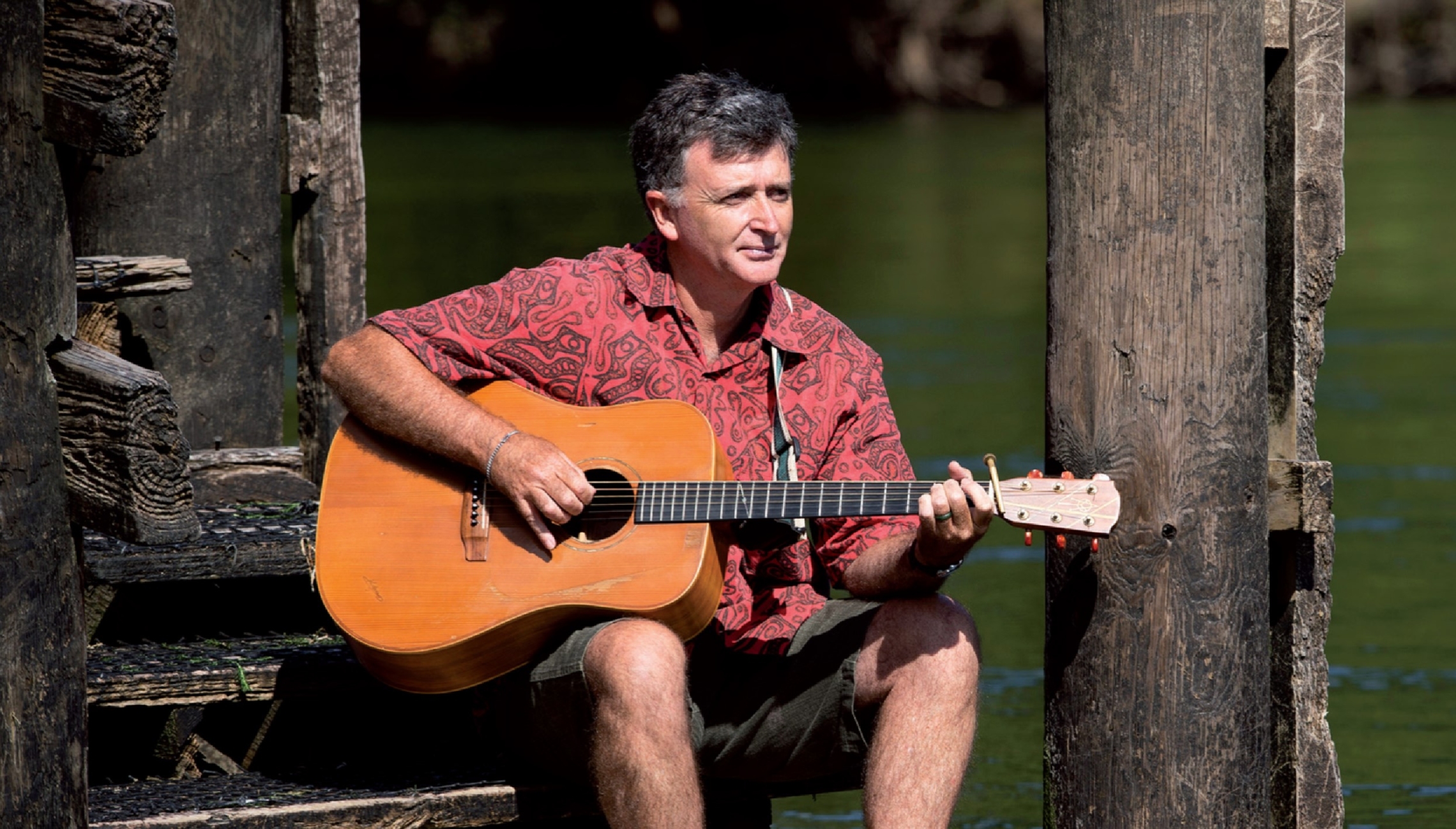 John Quinn with guitar - Geoff Osborne | Earth Sciences New Zealand | NIWA
