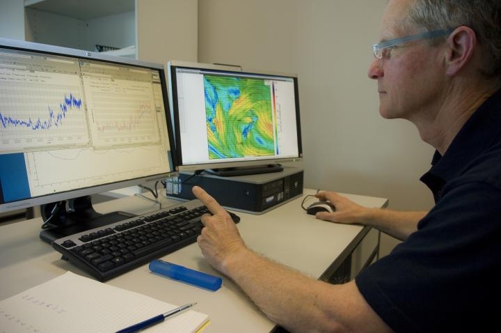 NIWA meteorologist Mike Revell checks the latest data from EcoConnect ...